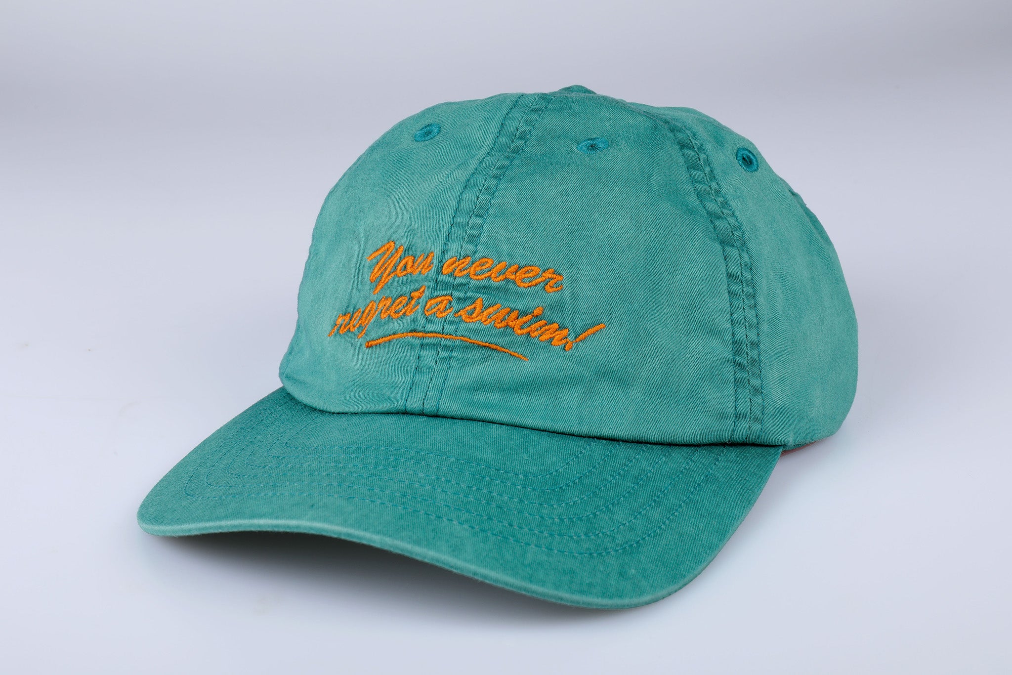 Green 'You Never Regret a Swim' Cap – Camp Cove Swim